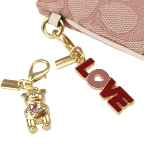 Mua Ví Cầm Tay Nữ Coach Boxed Dempsey Corner Zip Wristlet In Signature ...